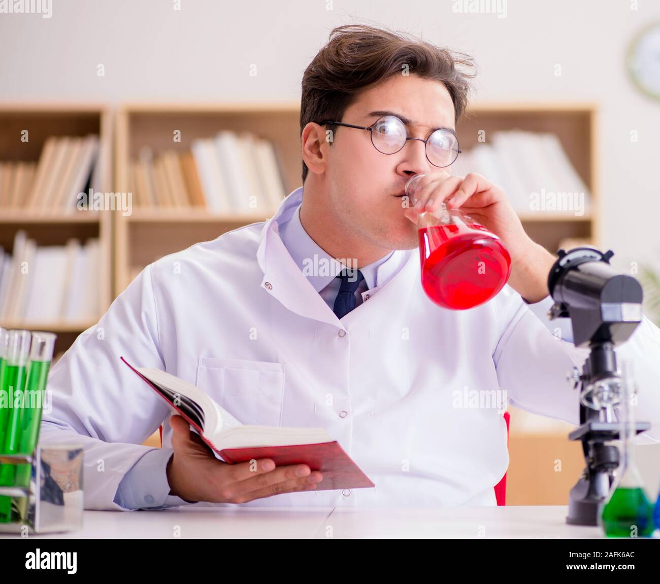 The mad crazy scientist doctor doing experiments in a laboratory Stock ...