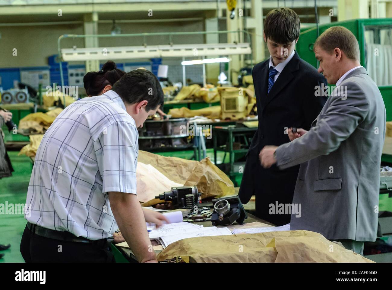 industrial quality control over factory background Stock Photo - Alamy
