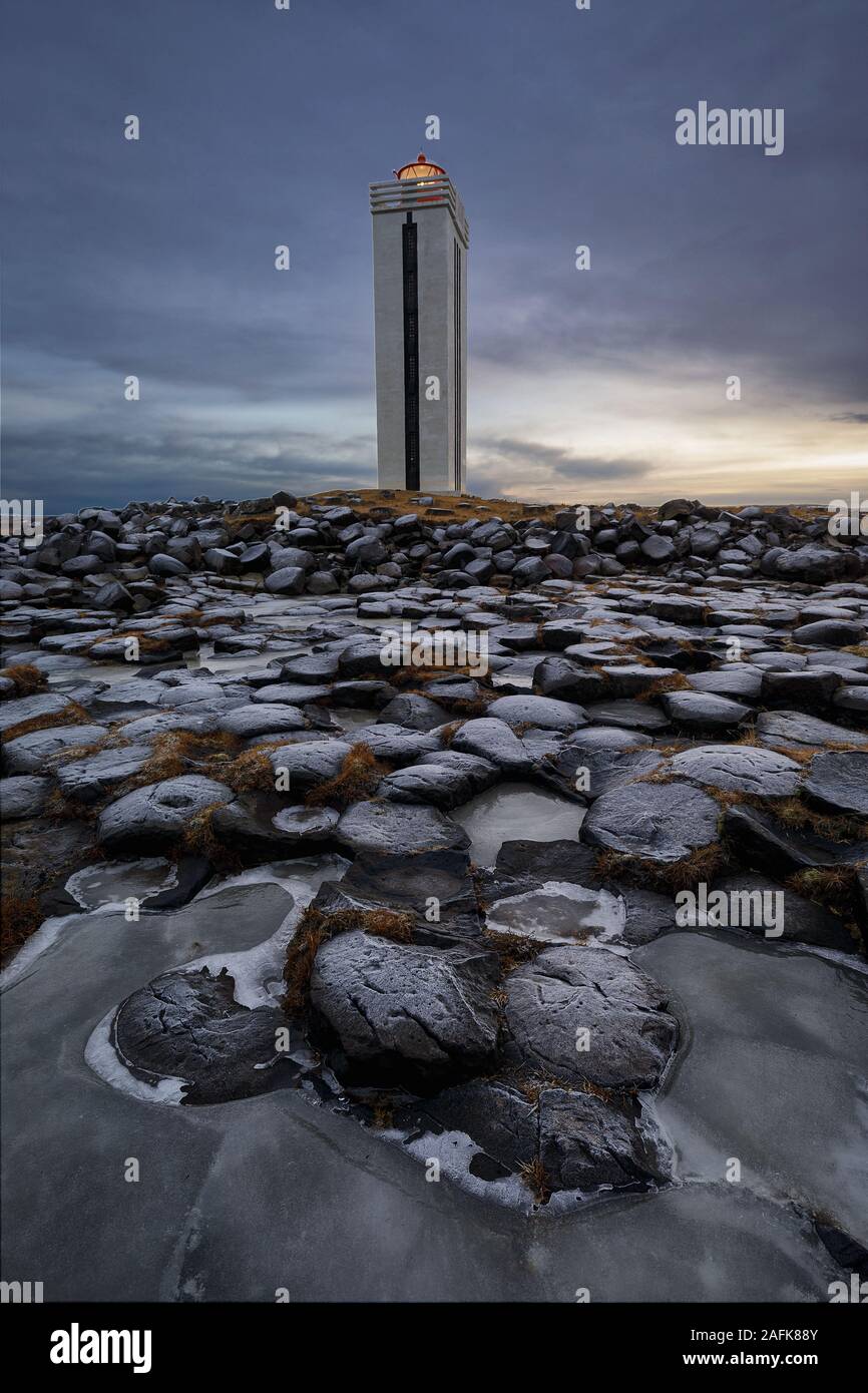 Basaltic columns in Kálfshamarsviti lighthouse in Iceland Stock Photo ...