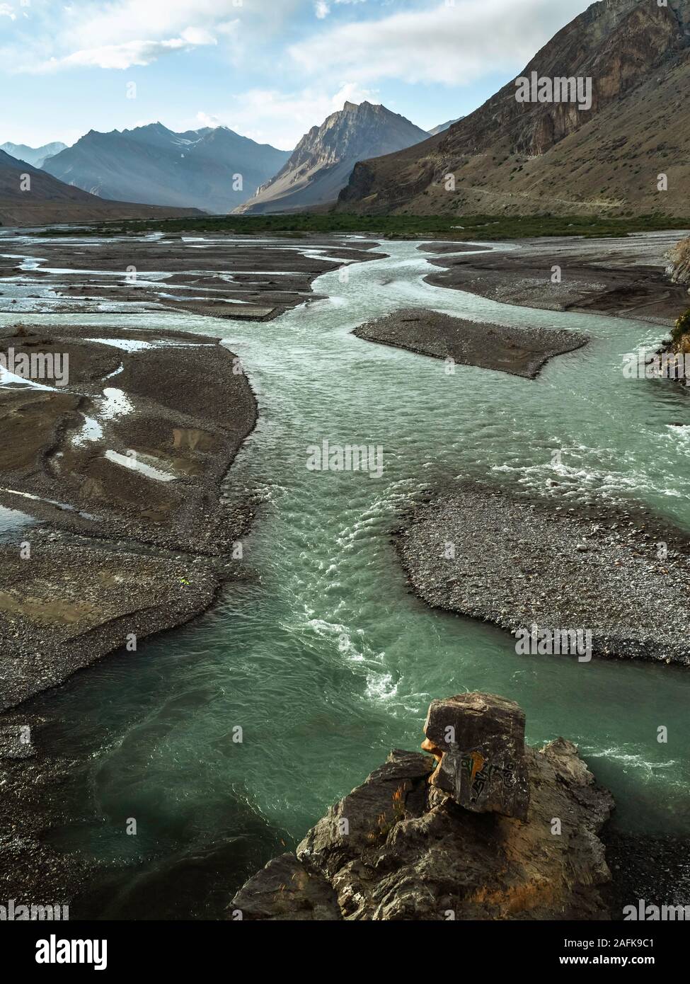 The Spiti river and Spiti valley flanked by the Himalayas at low level ...