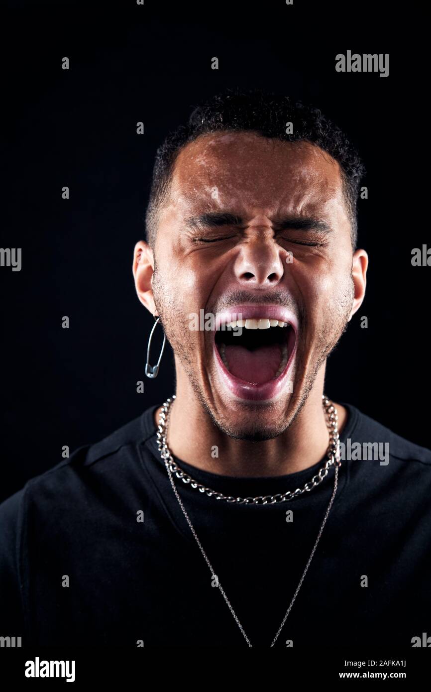 Head And Shoulders Studio Shot Of Angry Man Shouting At Camera Stock ...