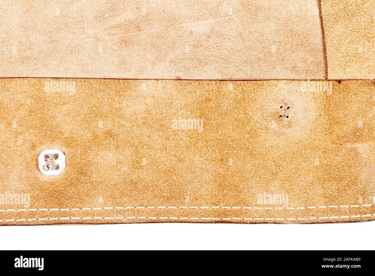 Piece of brown leather isolated on white background. Back side Stock ...