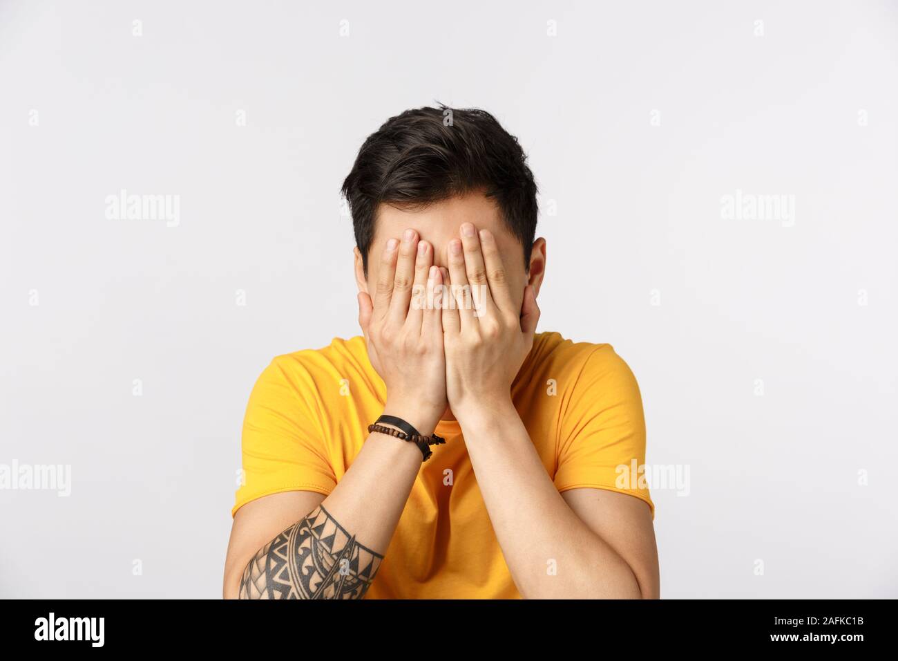 Timid boy hi-res stock photography and images - Alamy