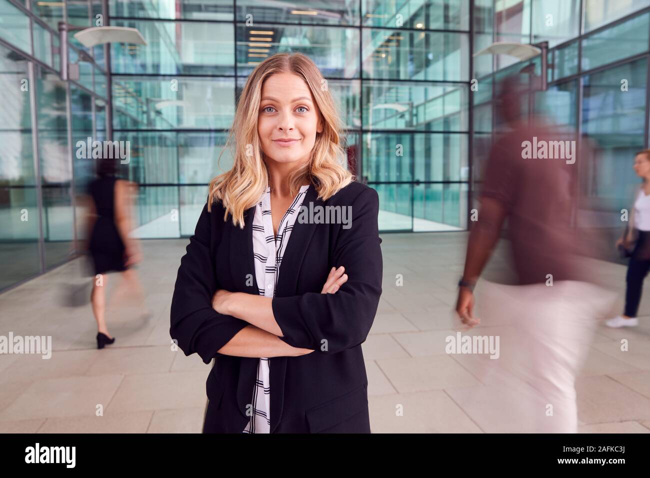 Busy woman walking modern office hi-res stock photography and images ...