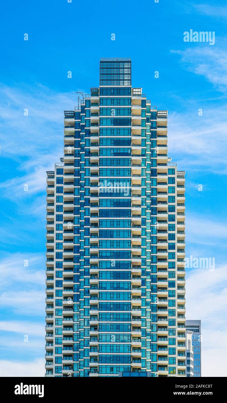 Modern Blue and White Condo Tower Stock Photo - Alamy
