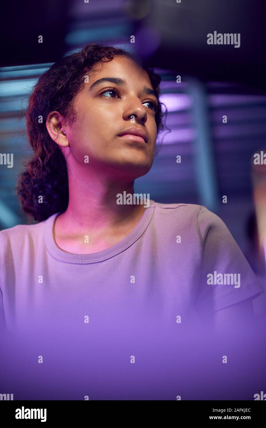 Female Teenage Hacker Sitting Between Computer Screens Bypassing Cyber ...