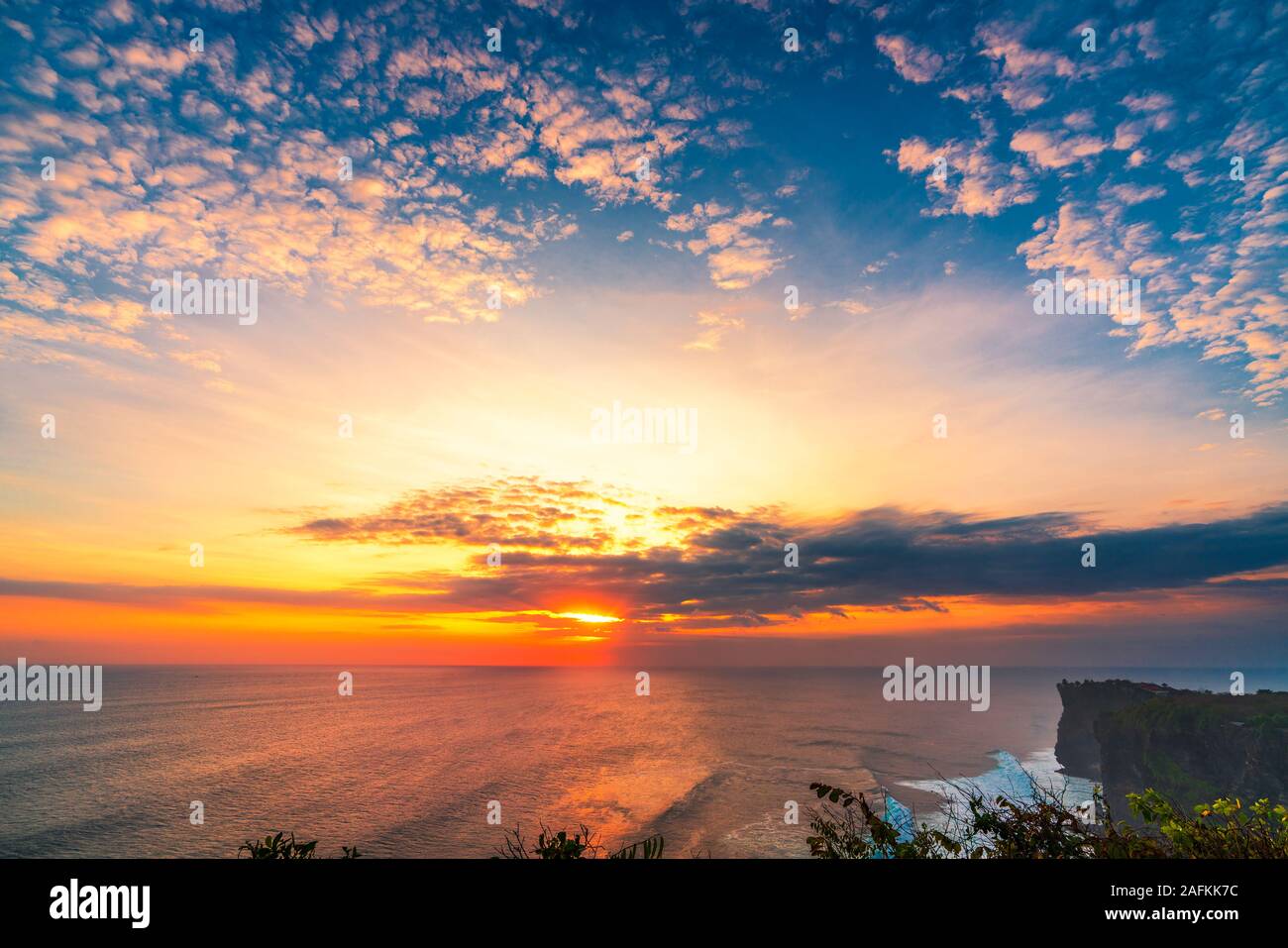 Landmark of Bali: Uluwatu Temple one of six key temples Bali at sunset ...