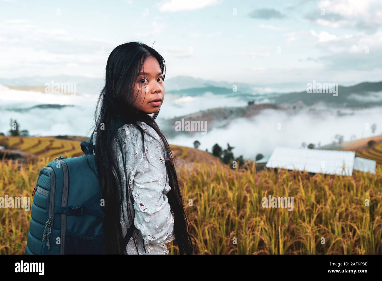 Woman walking in the rice field Bali Stock Photo - Alamy