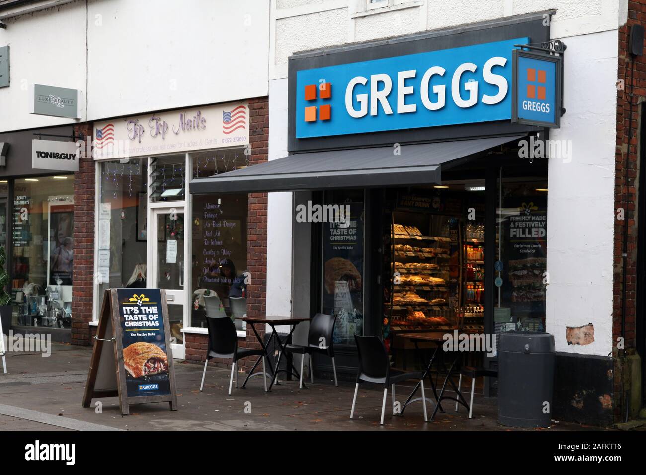 Greggs bakery Leatherhead Town centre, high street shop front with ...