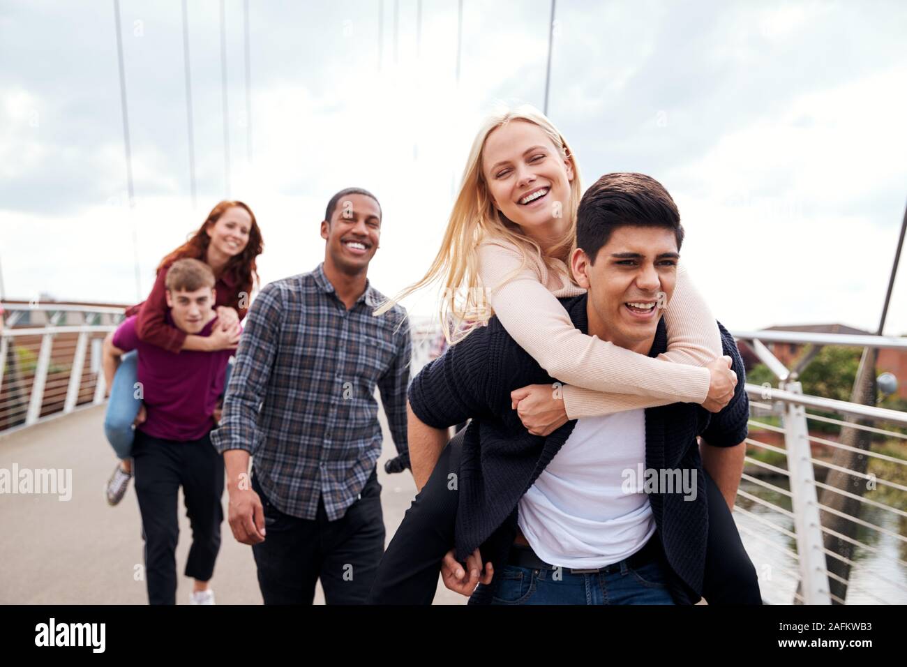 Student Friends With Men Giving Women Piggyback Rides Across City ...