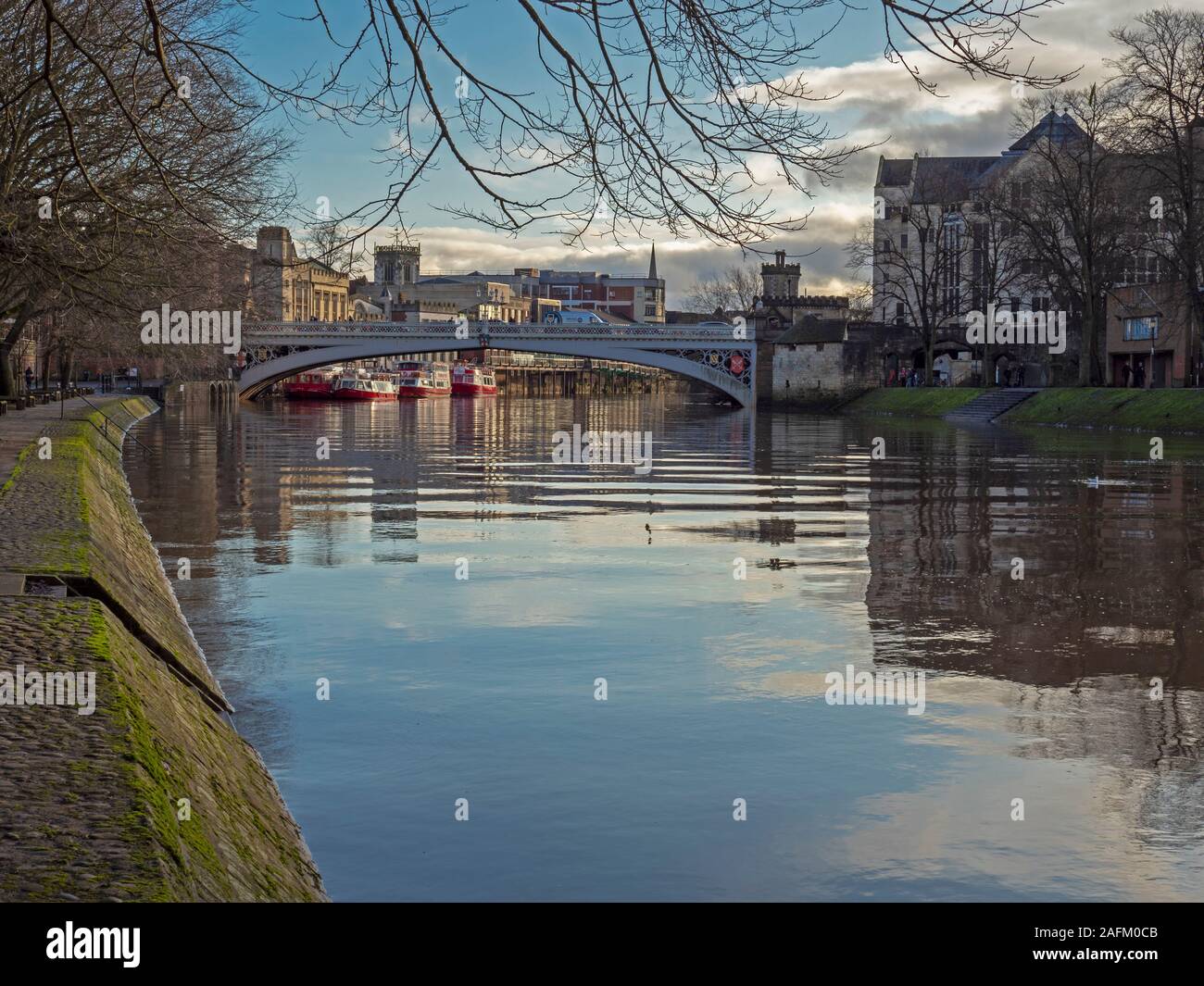 View of the River Ouse and Lendal Bridge with riverside buildings and ...