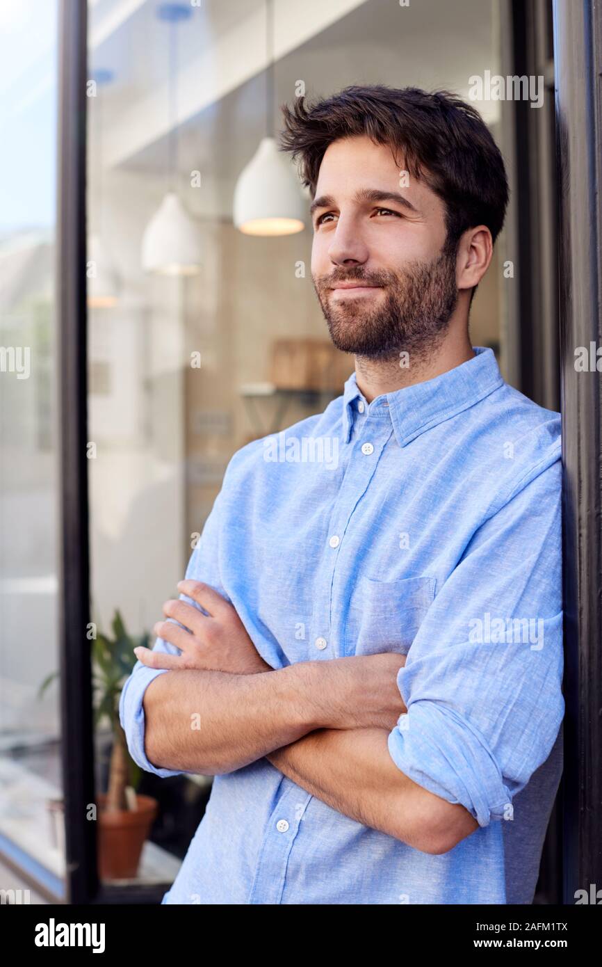 Portrait Of Male Owner Standing Outside Coffee Shop Stock Photo - Alamy
