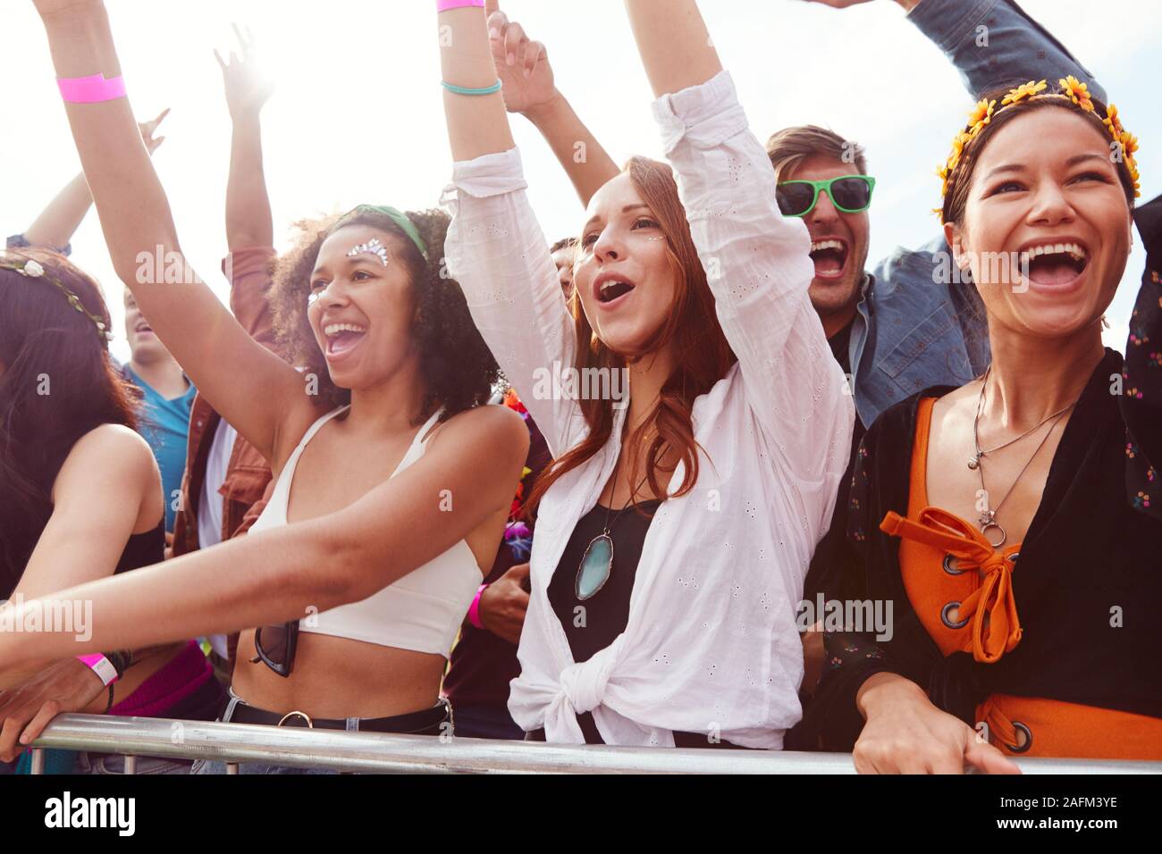 Woman cheering behind hi-res stock photography and images - Alamy