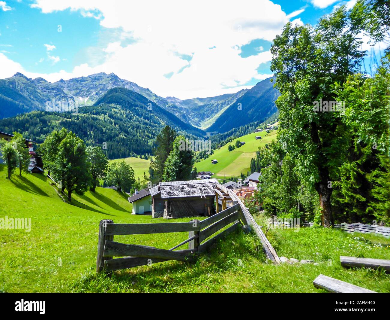 A stunning view on Alpine valley. Hiking trails in the high mountain ...