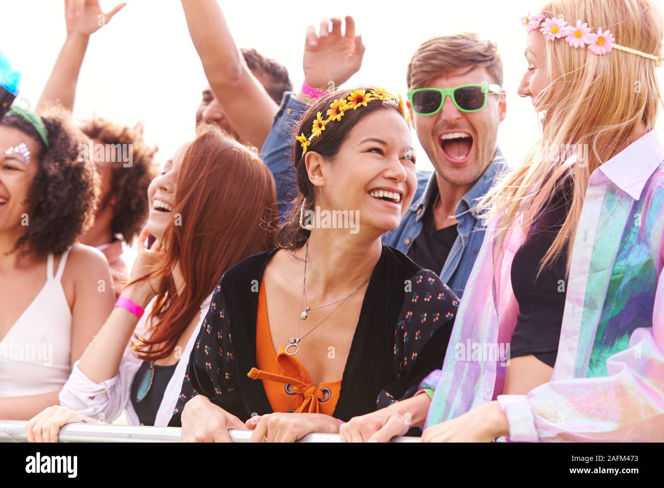 Woman cheering behind hi-res stock photography and images - Alamy
