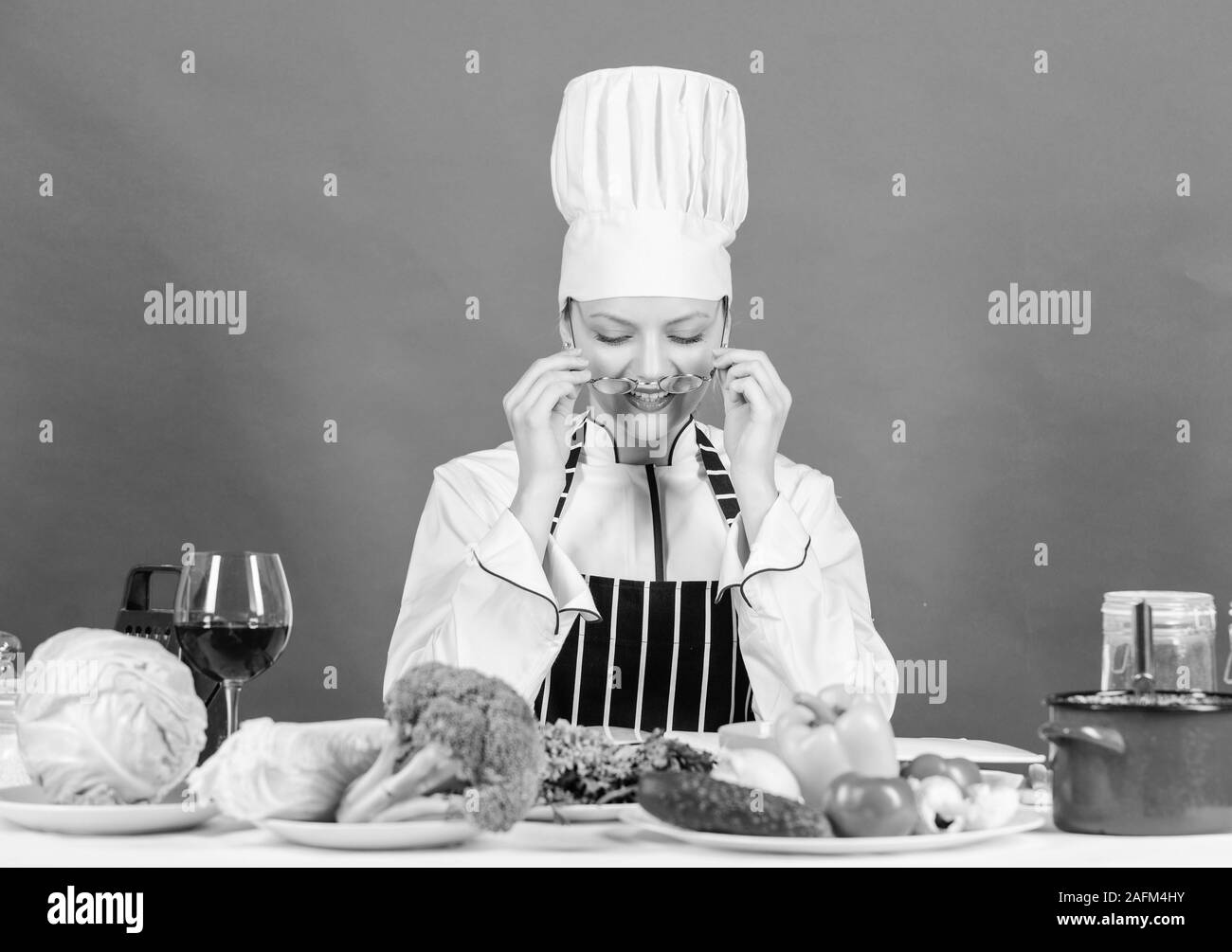 Culinary expert. Woman chef cooking healthy food. Fresh vegetables ...