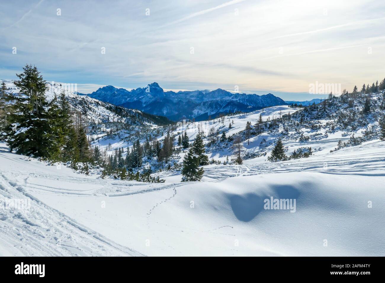 Cloudy morning in Alps, Nassfeld, Austria. Mountain slopes covered with ...