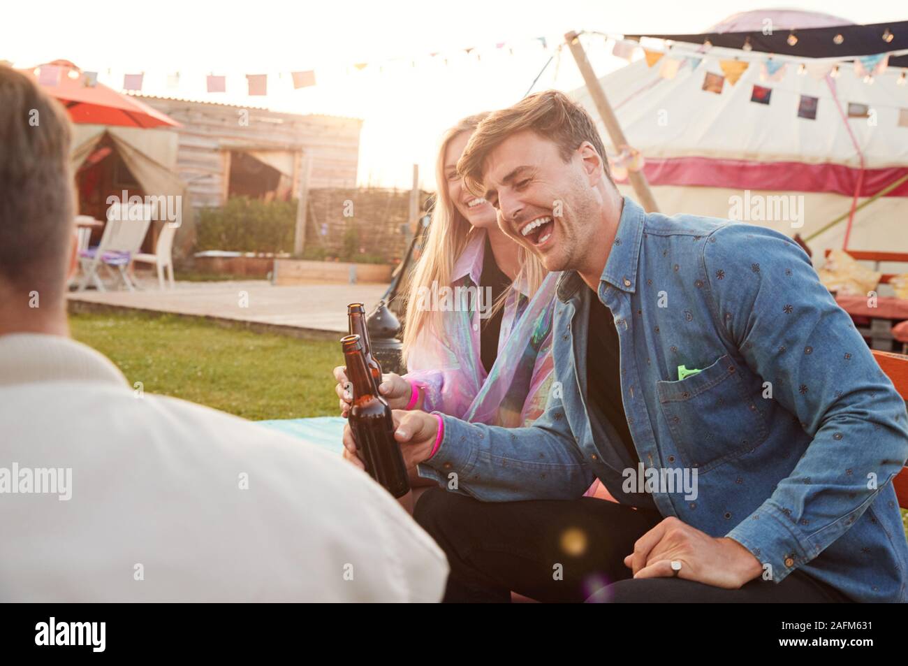 Male friends talking concert hi-res stock photography and images - Alamy