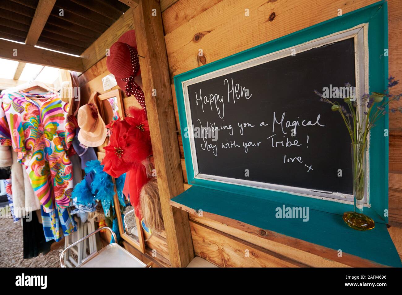 Sign In Communal Room On Glamping Camp Site With Vintage Clothing Stock ...
