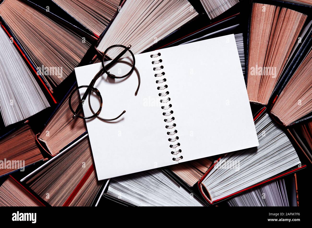 Library. Books. Old open books stand on a bookshelf ready to read Stock ...