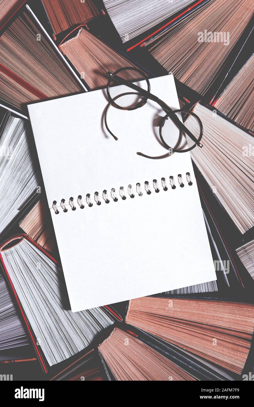 Library. Books. Old open books stand on a bookshelf ready to read Stock ...