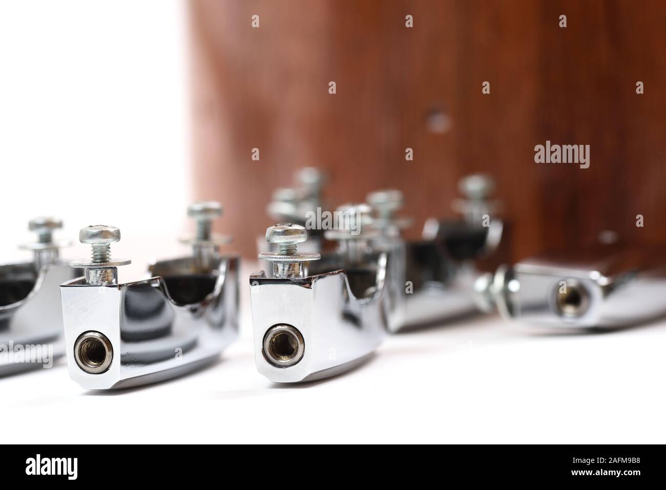 Percussion musical instrument. Metal fittings for wooden drum isolated ...