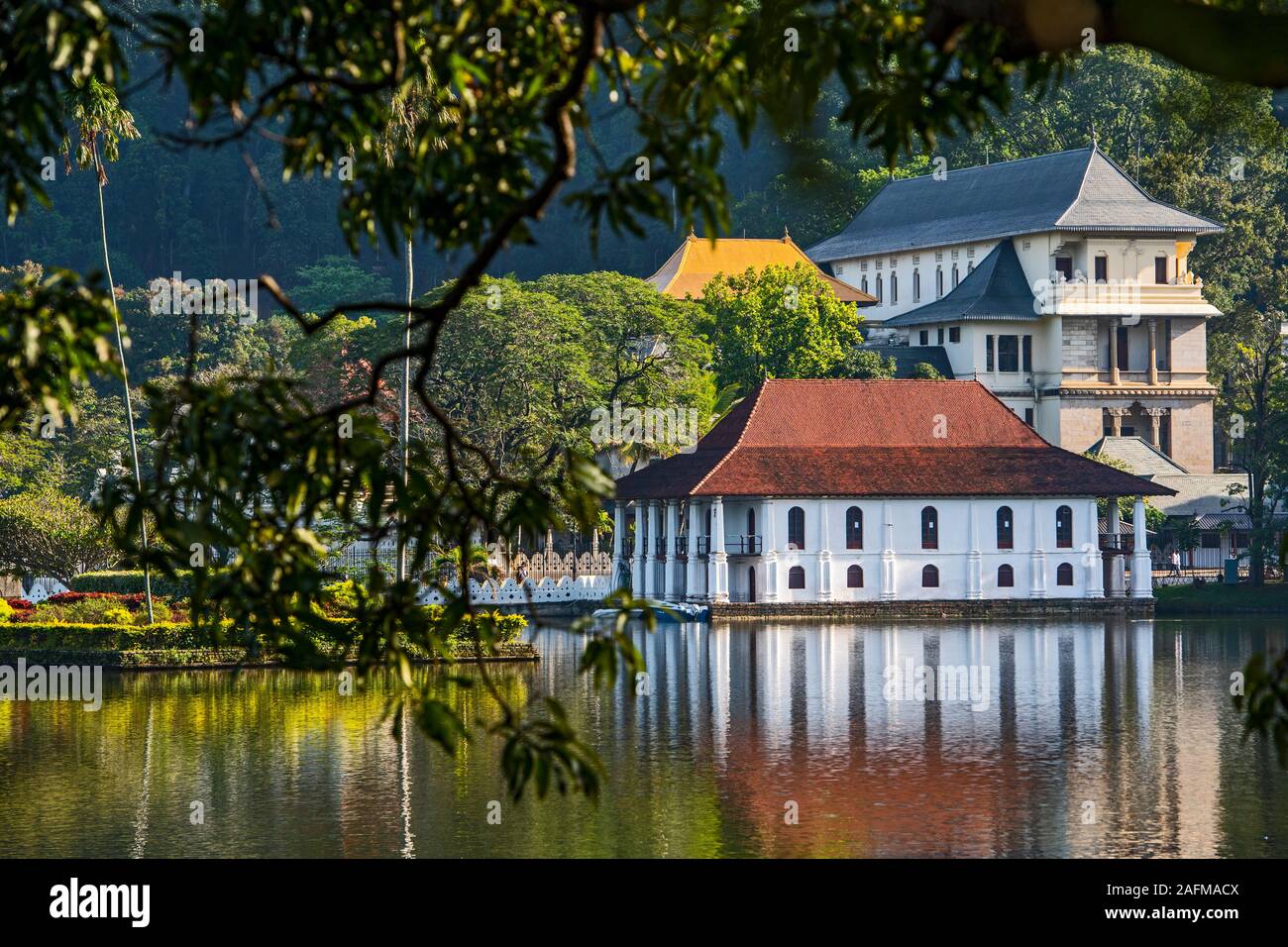the temple of the holy tooth relict in Kandy see from the lake Stock ...
