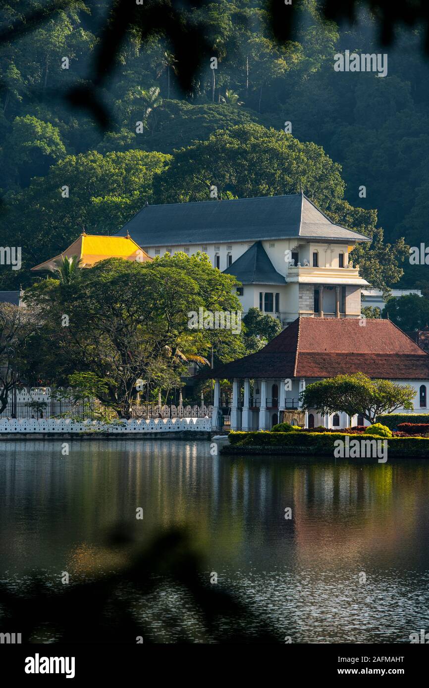 the temple of the holy tooth relict in Kandy see from the lake Stock ...