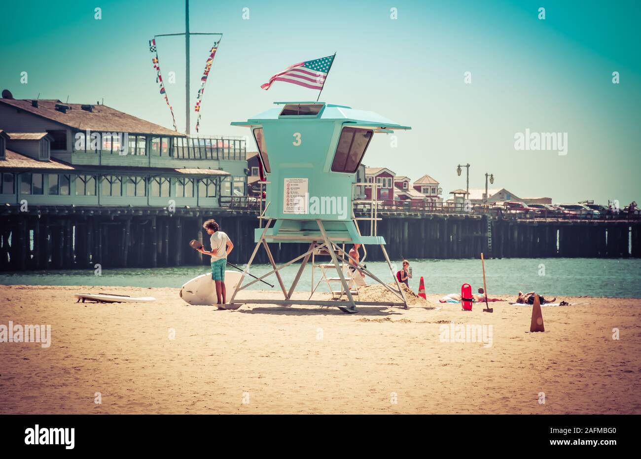 Man near signs on beach hi-res stock photography and images - Alamy