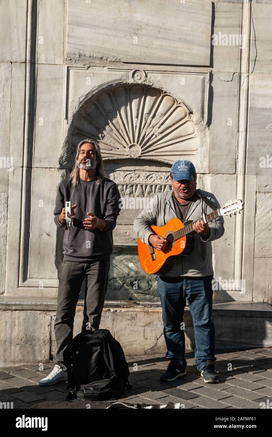 Turkish musicians busking along Istiklal street, near Taksim square ...