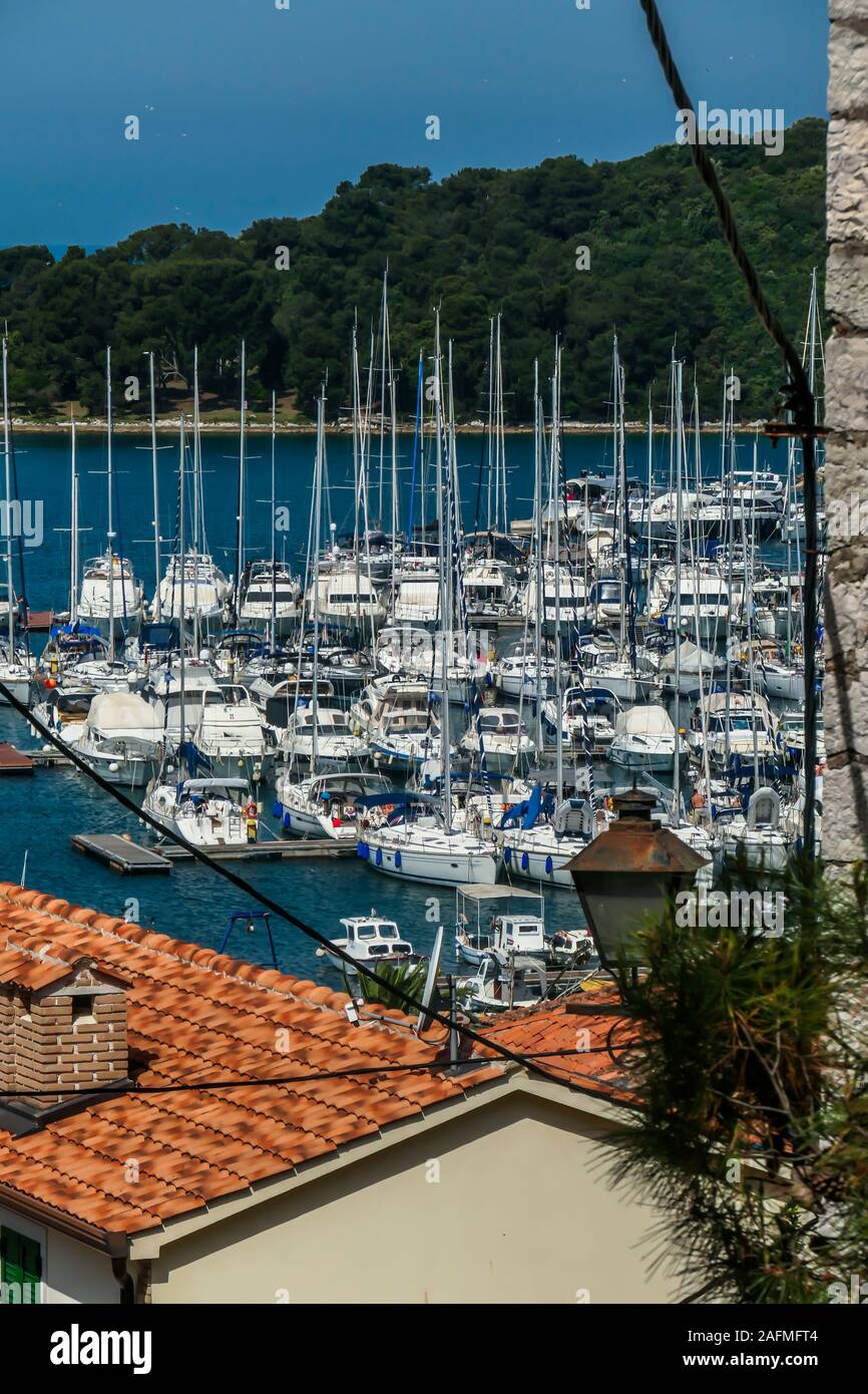 A close-up view on the harbour from a hill. Rows of docks waiting for ...