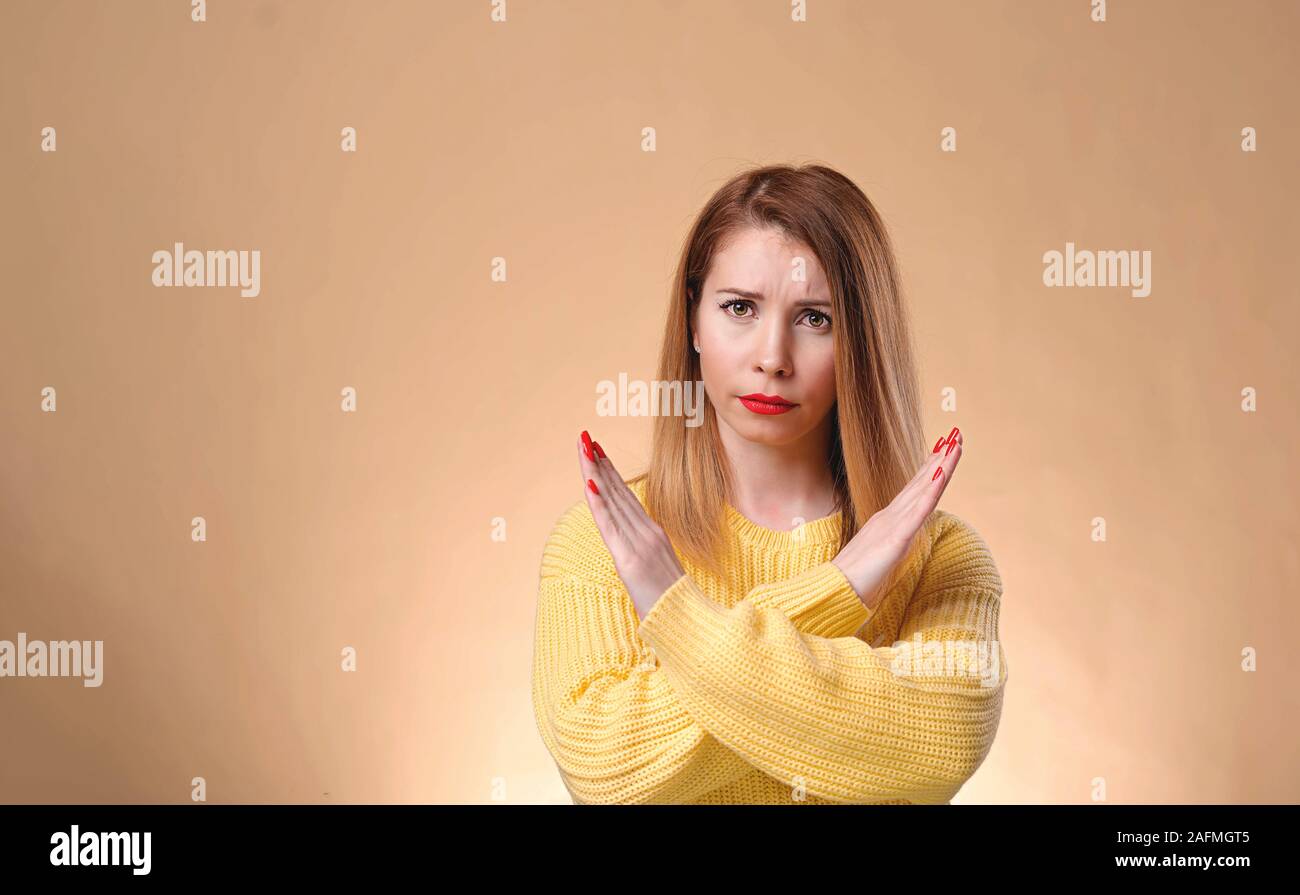 Young hand on cross hi-res stock photography and images - Alamy