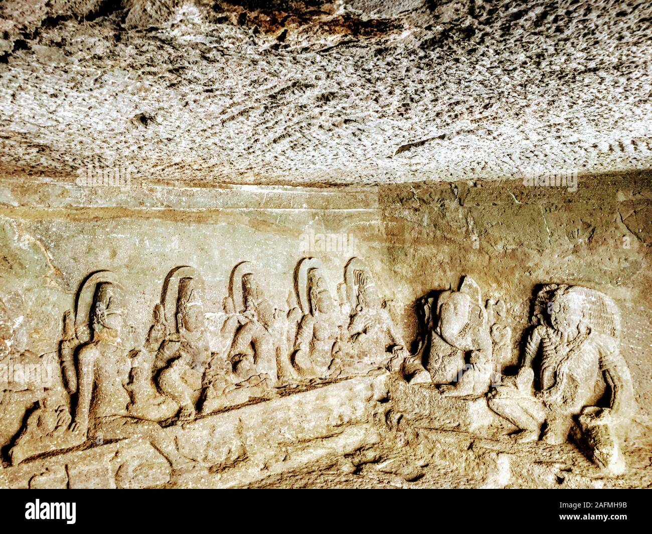 Ajanta caves with Buddha statue and beautiful architectural carvings on ...