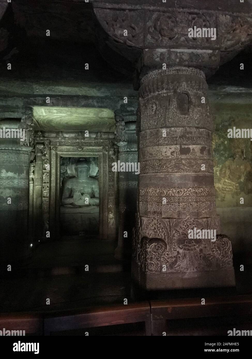 Ajanta caves with Buddha statue and beautiful architectural carvings on ...
