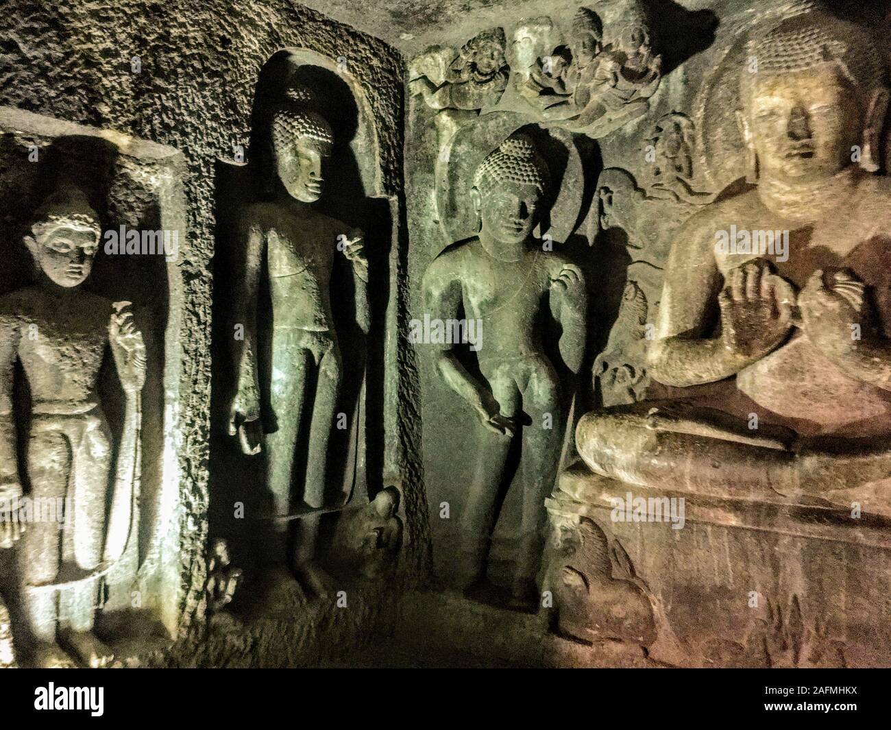 Ajanta caves with Buddha statue and beautiful architectural carvings on ...