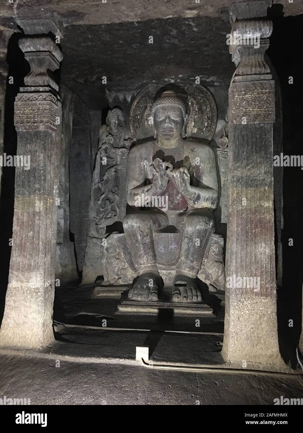 Ajanta caves with Buddha statue and beautiful architectural carvings on ...
