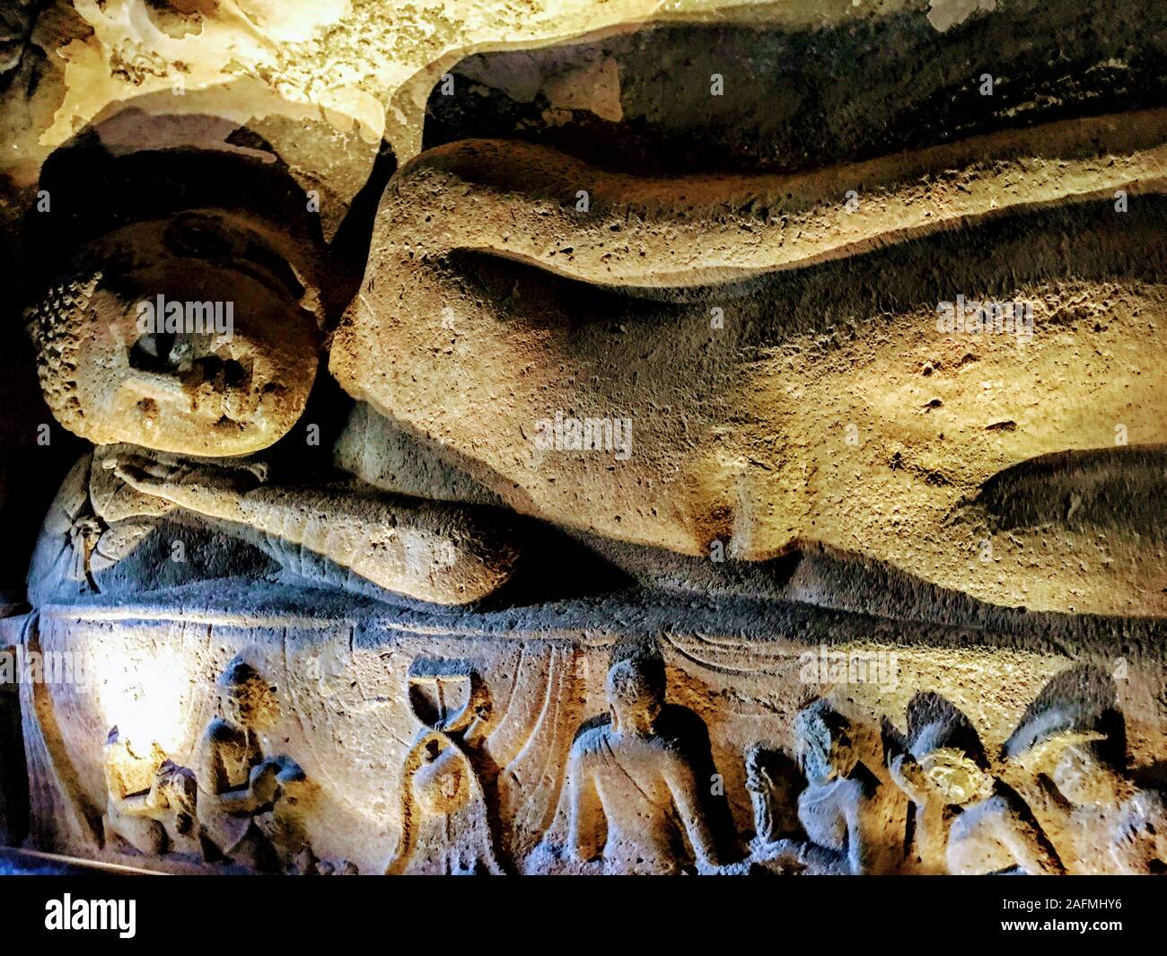 Ajanta caves with Buddha statue and beautiful architectural carvings on ...