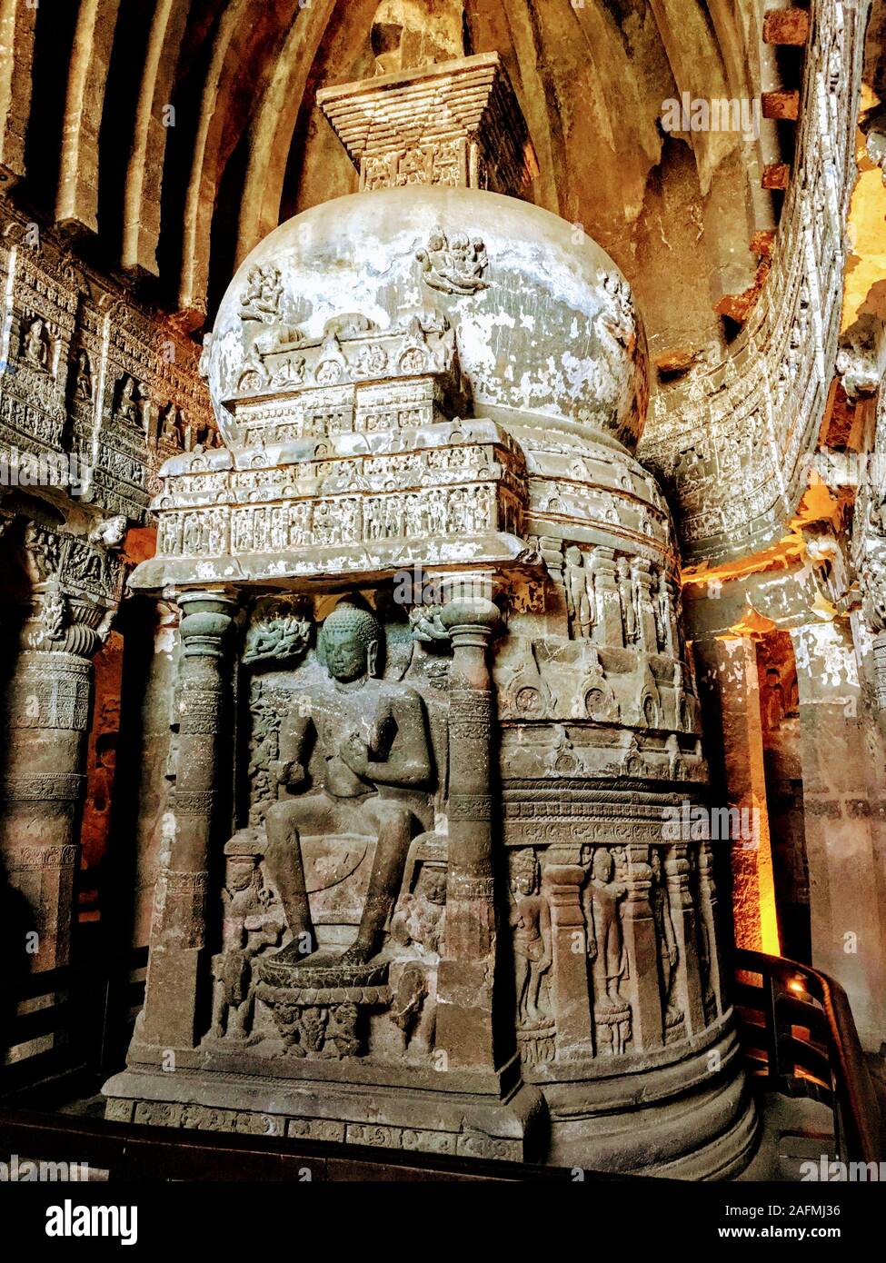 Ajanta caves with Buddha statue and beautiful architectural carvings on ...