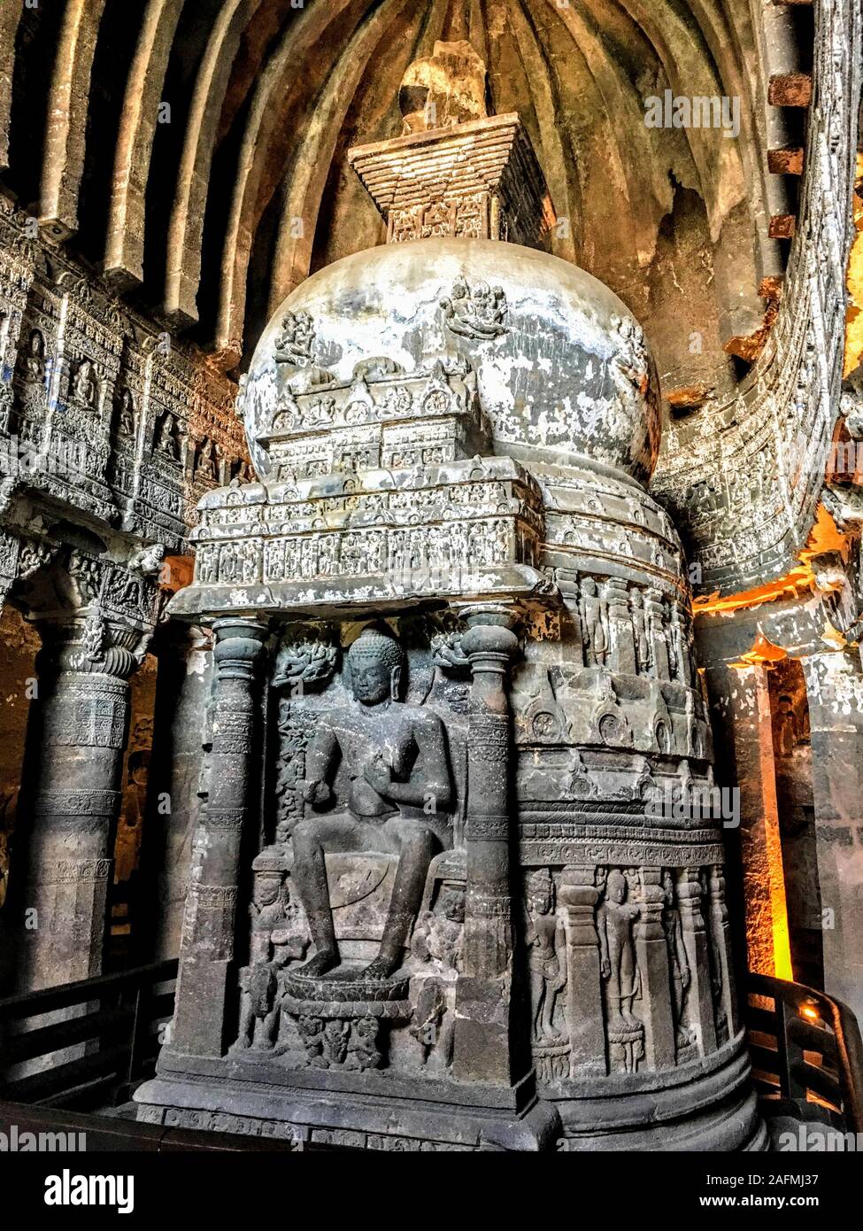 Ajanta caves with Buddha statue and beautiful architectural carvings on ...