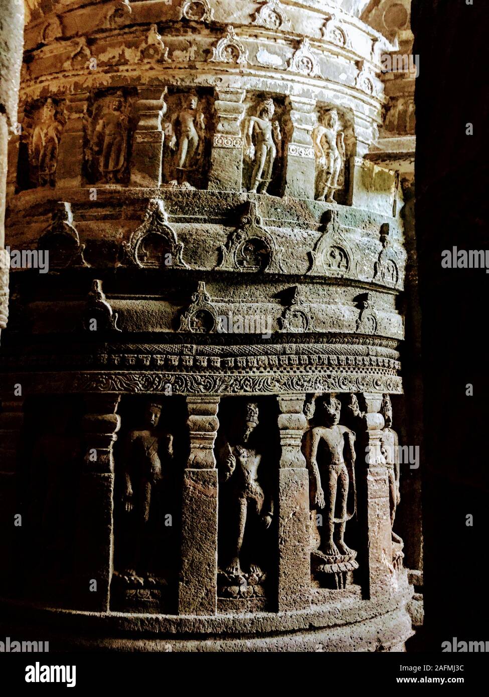 Ajanta caves with Buddha statue and beautiful architectural carvings on ...