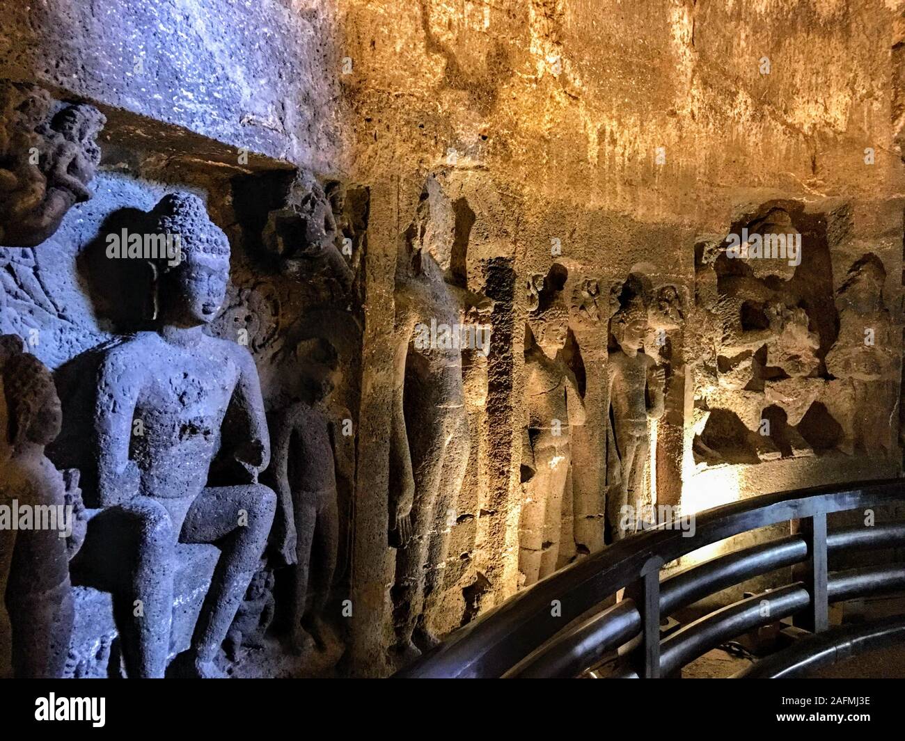 Ajanta caves with Buddha statue and beautiful architectural carvings on ...
