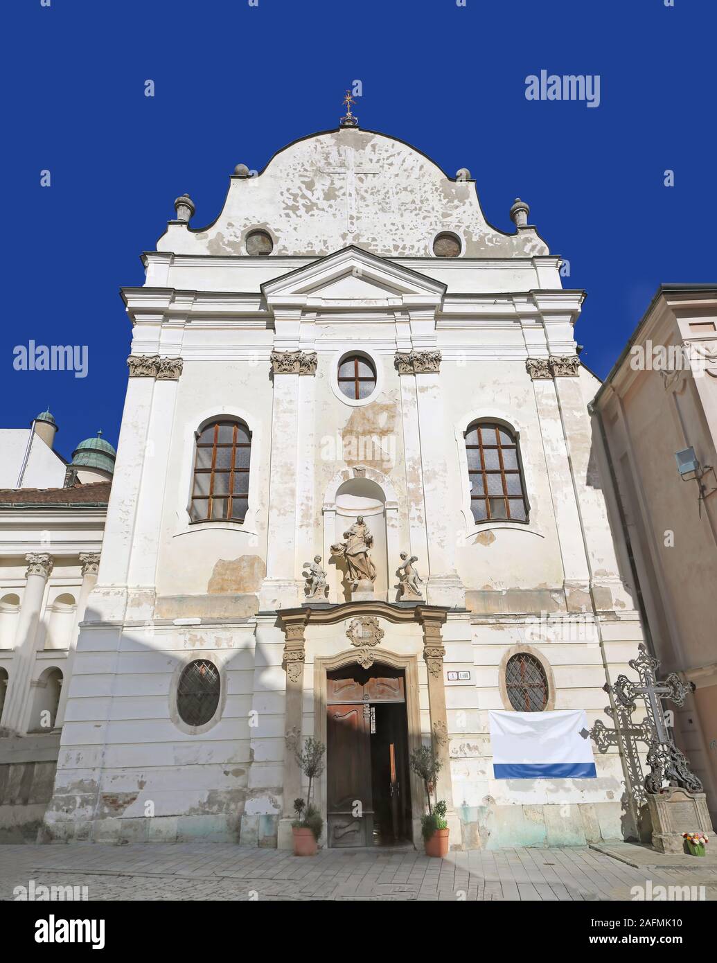 View of facade of Franciscan Church in the old town in Bratislava ...