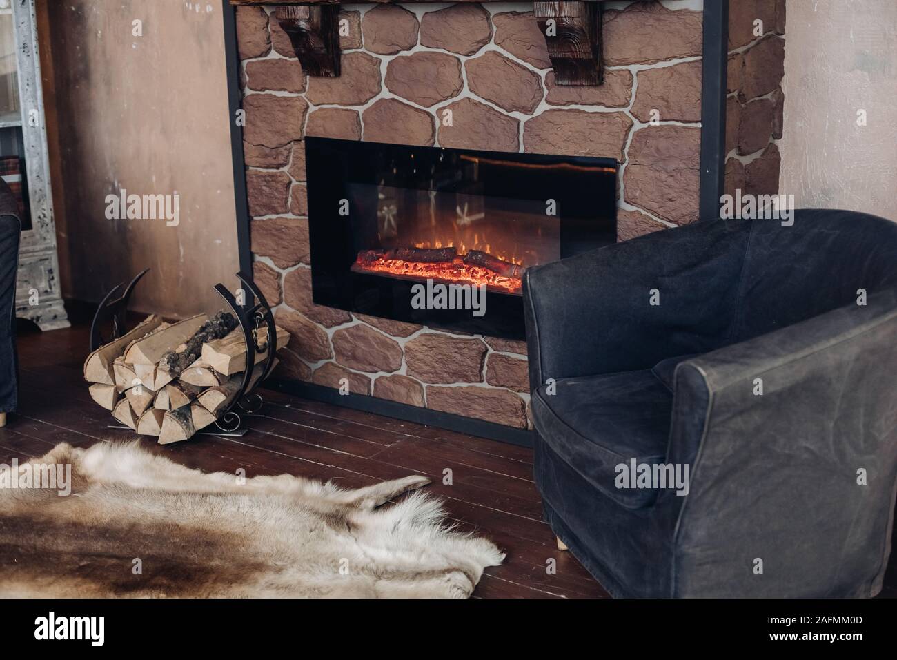 Modern fireplace with burning wooden logs hi-res stock photography and ...