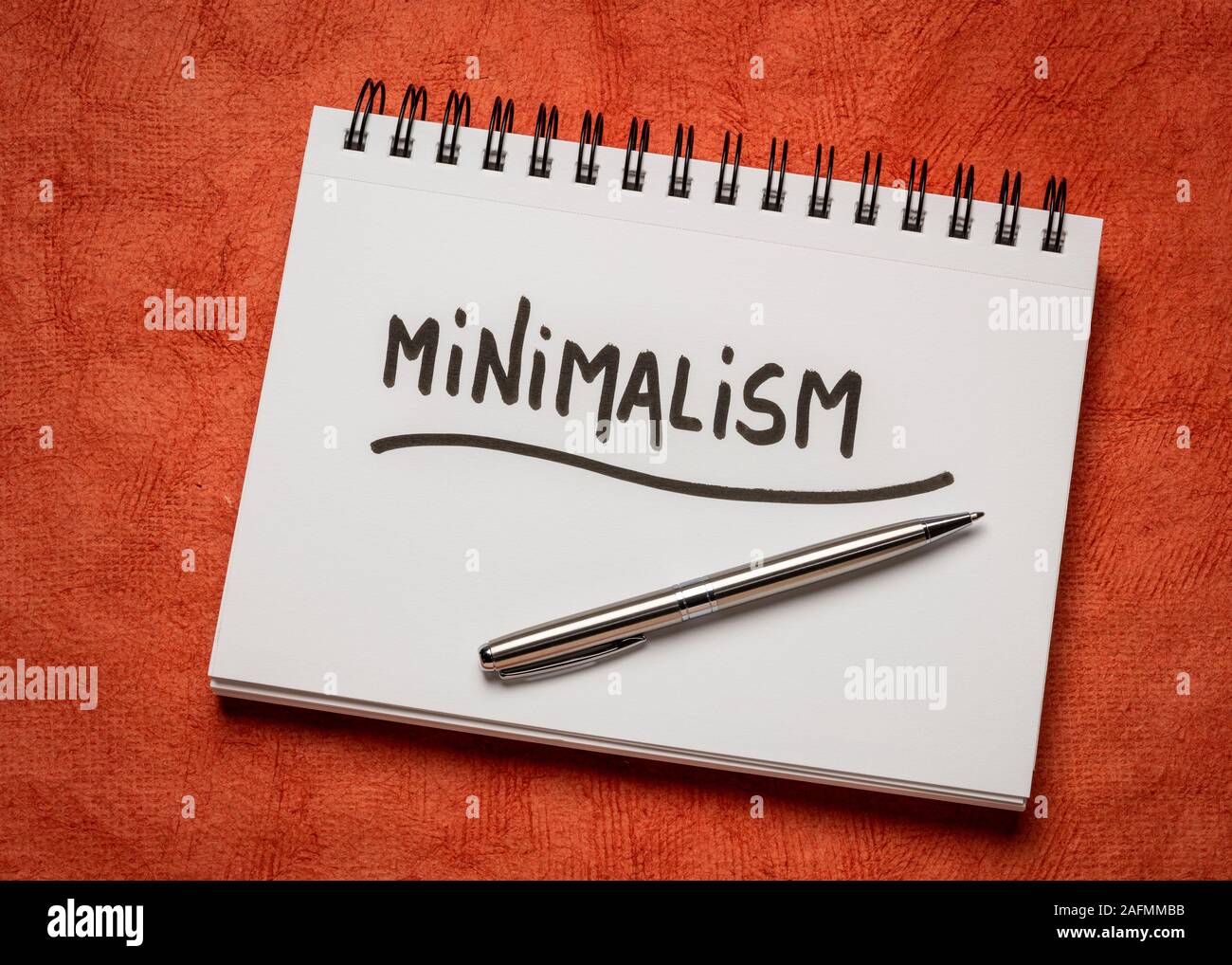minimalism word - handwriting in a sketchbook, simplicity and eco ...