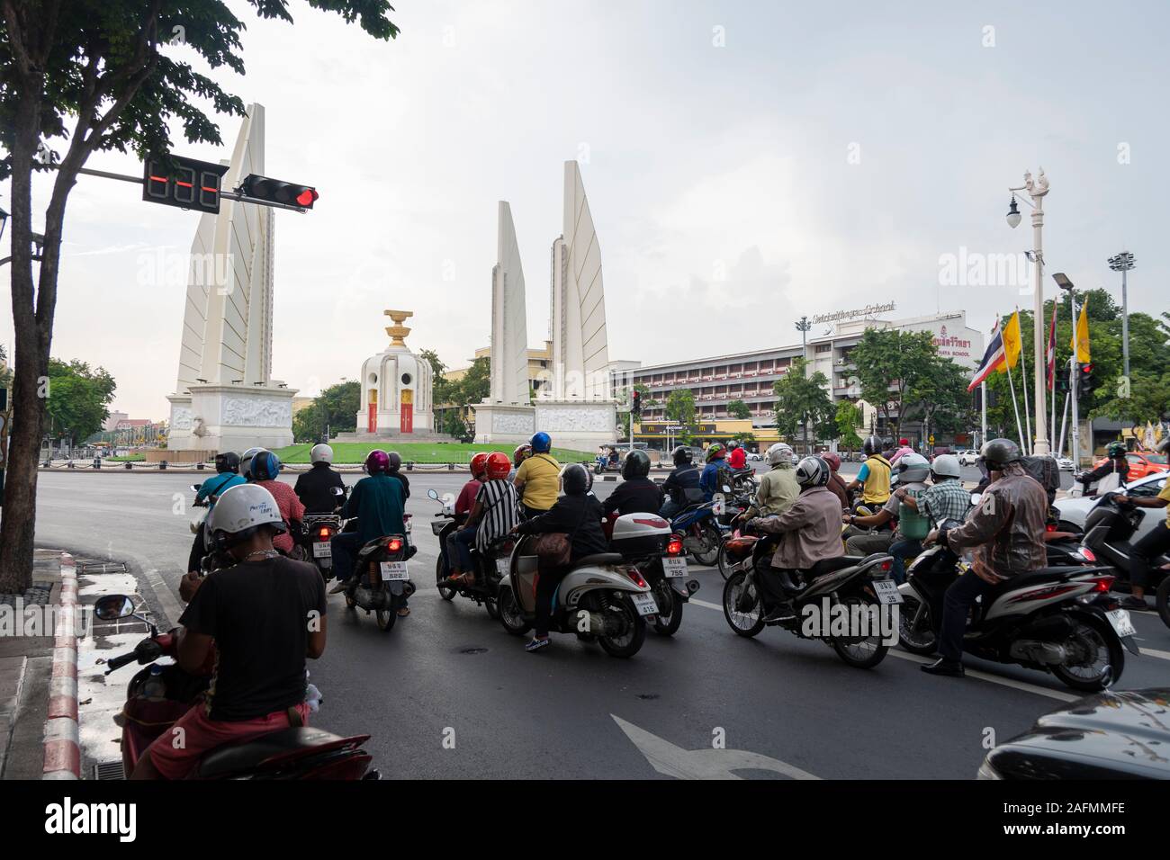 Motorcycles passing Democracy Monument, Bangkok, Thailand Stock Photo ...