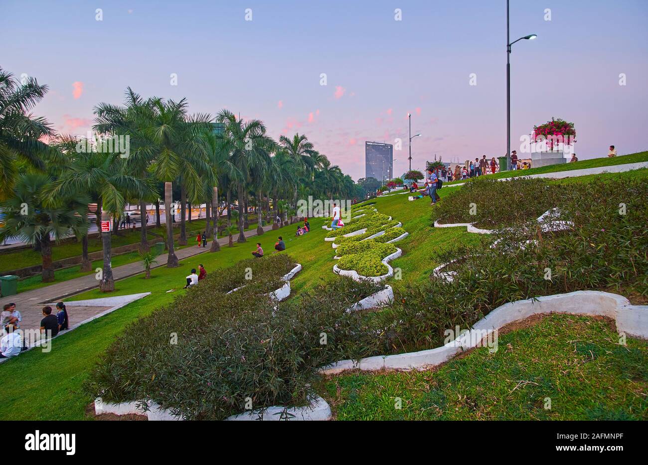 YANGON, MYANMAR - MARCH 2, 2018: Inya lake park is one of the most ...
