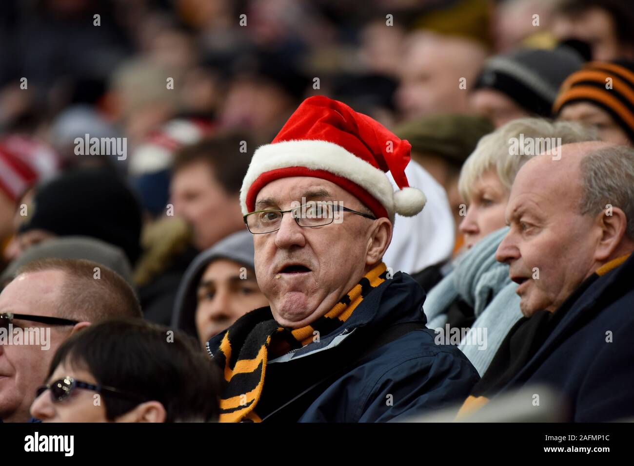 Football fan supporter wearing seasonal Santa hat Britain Uk Stock ...