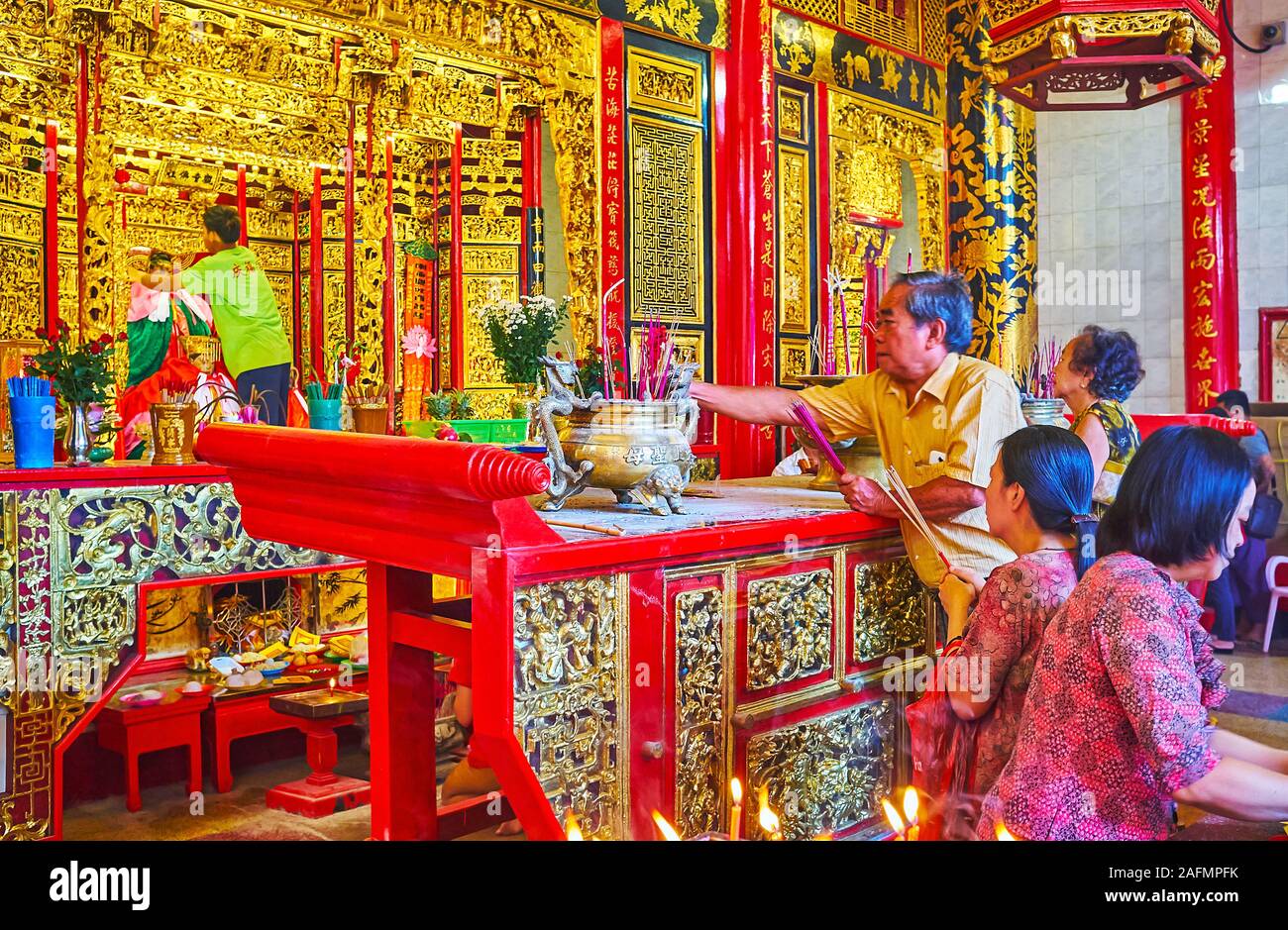 YANGON, MYANMAR - FEBRUARY 17, 2018: The numerous devotees with aroma ...