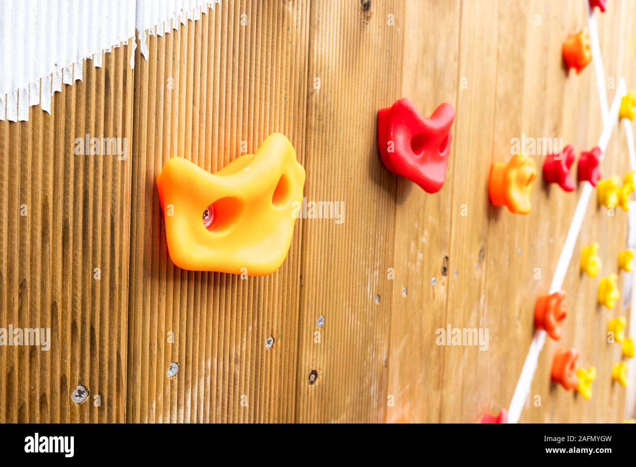 A children's playground with climbing wall for children Stock Photo - Alamy