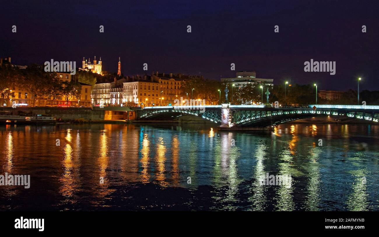 city scene, night, lighted buildings, bridge, reflections, Soane River ...